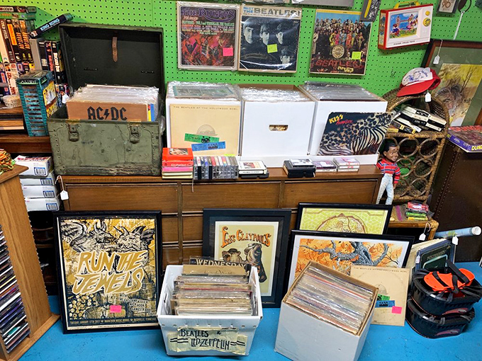 Vinyl records and vintage posters that remind us when album art was an event, not just a tiny square on your phone.