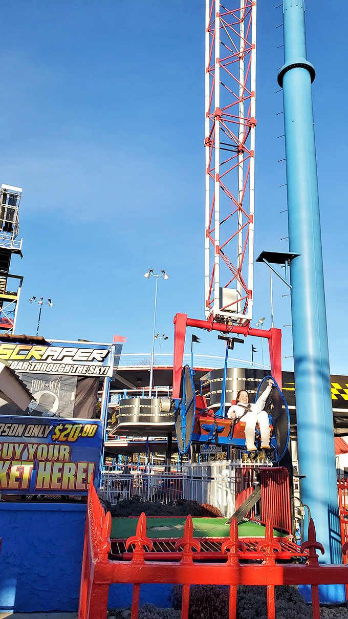Thrill rides punctuate the shopping experience. Because nothing says "retail therapy break" like being flung through the air at impressive speeds.
