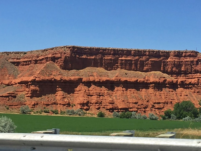 Layer cake geology that makes scientists swoon. These red rock formations tell Earth's autobiography one sedimentary chapter at a time.