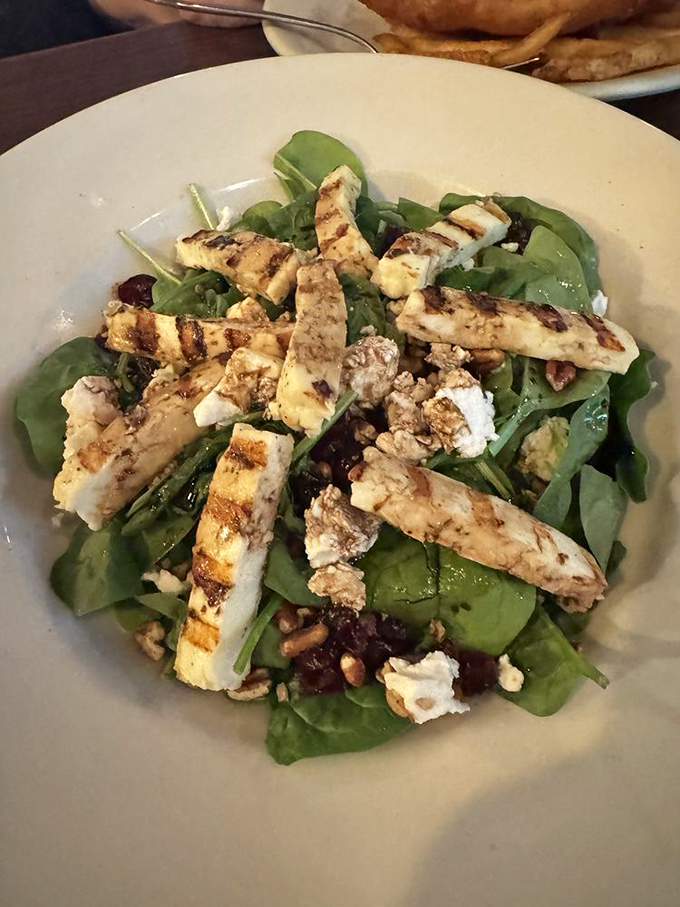 A salad that actually satisfies! Grilled halloumi cheese and fresh greens prove that "eating light" doesn't have to mean "leaving hungry."