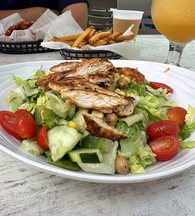 This salad proves healthy eating needn't be punishment—grilled chicken and fresh vegetables in perfect harmony.