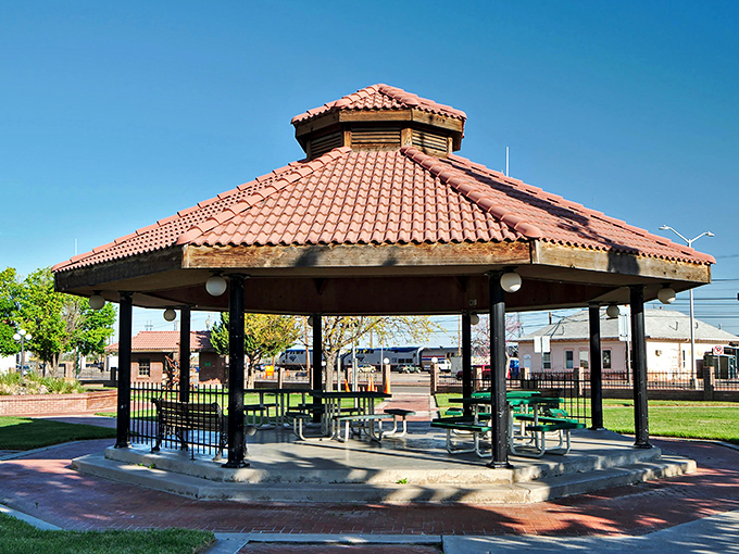 Santa Fe Plaza's elegant gazebo stands ready for everything from first kisses to band concerts. Those picnic tables have heard more town secrets than the local barber shop.