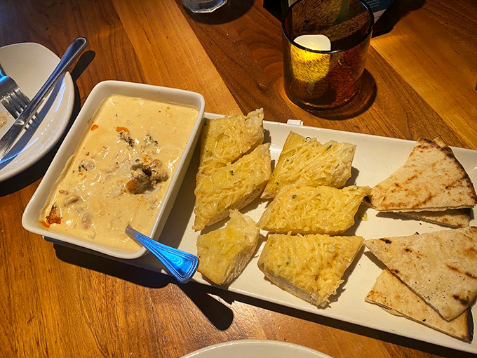 Seafood fondue that makes bread the luckiest food in the world &ndash; a creamy, cheesy hot tub where seafood throws its most delicious party.