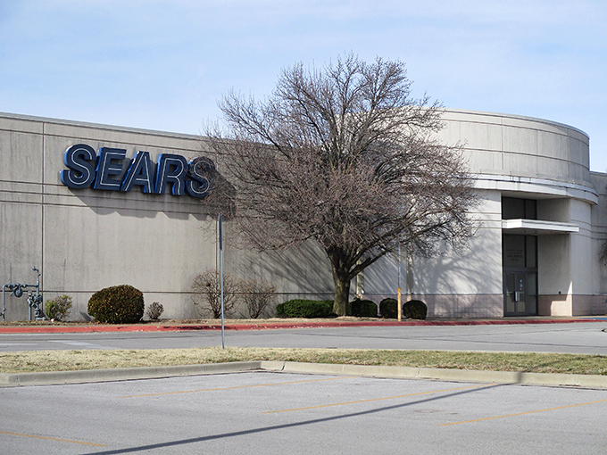 The Sears building stands like a retail ghost of Christmas past. Once the Amazon of its day, it now serves as a reminder that even retail giants take afternoon naps.