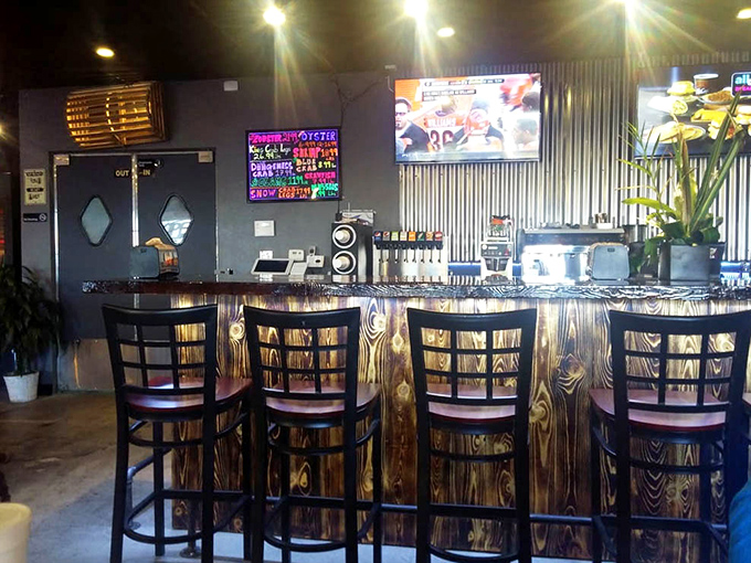 The wood-paneled bar front adds warmth to the space, like a captain's quarters reimagined for seafood enthusiasts.