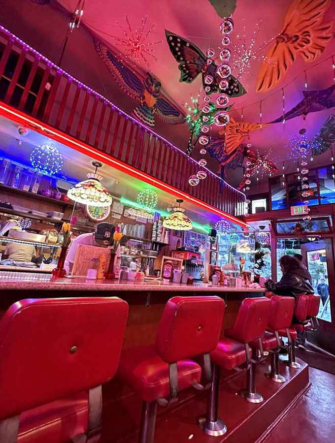 Those butterfly decorations and rainbow stripes remind you this isn't just any diner – it's a Castro original.