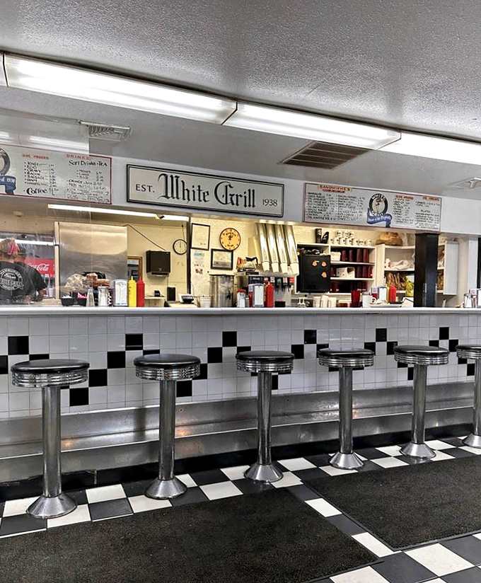 The grill counter view&mdash;where burger magic happens in plain sight, no smoke and mirrors, just honest cooking on well-seasoned surfaces.