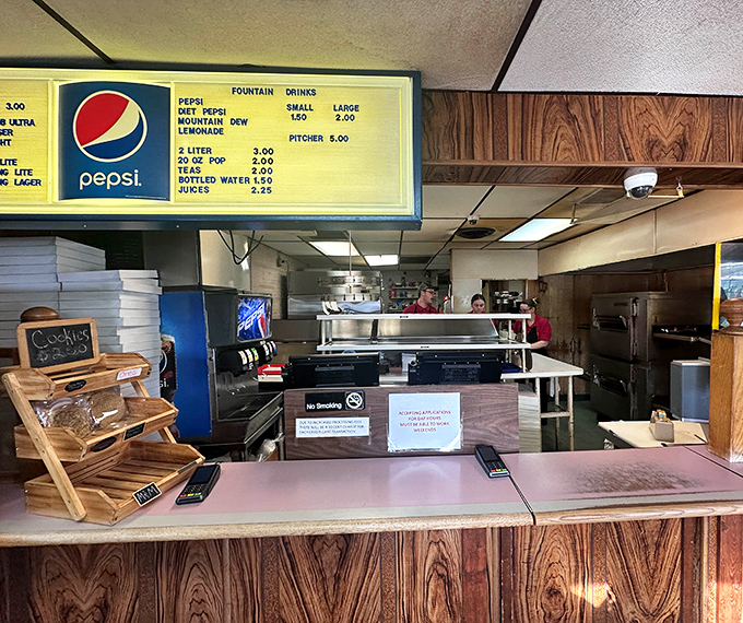 Behind the scenes where pizza magic happens. No molecular gastronomy lab here&mdash;just decades of know-how and well-seasoned equipment.