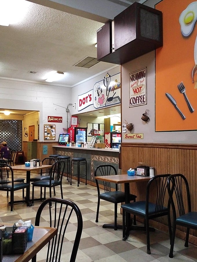 Retro charm meets practical comfort in this dining area where conversations flow as freely as the coffee refills.