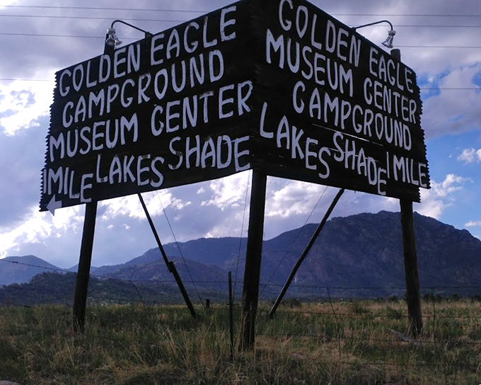 Nearby attractions advertised on vintage signage &ndash; because after seeing a giant beetle, why not continue the adventure?