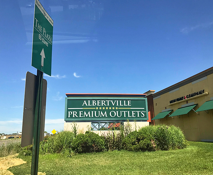 The entrance sign welcomes you to Albertville Premium Outlets, where your budget and your wardrobe can finally become friends.