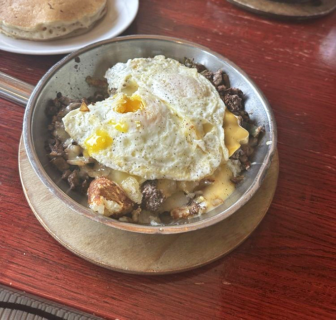 The skillet&mdash;where breakfast ingredients go to find their higher purpose under a perfectly fried egg.