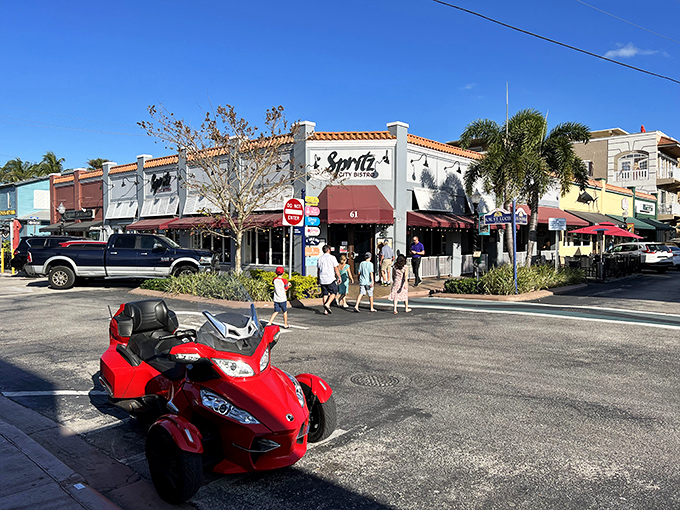 Downtown Stuart's colorful storefronts invite leisurely exploration, where even three-wheeled motorcycles seem perfectly at home on these relaxed streets.