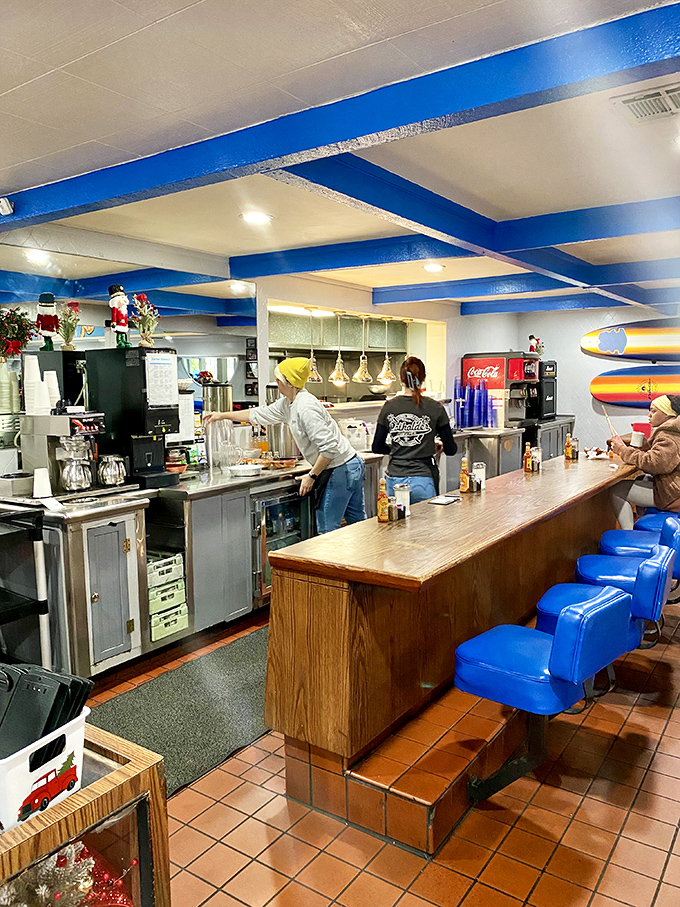 Counter seating: where solo diners become breakfast philosophers and coffee cup refills appear like magic.