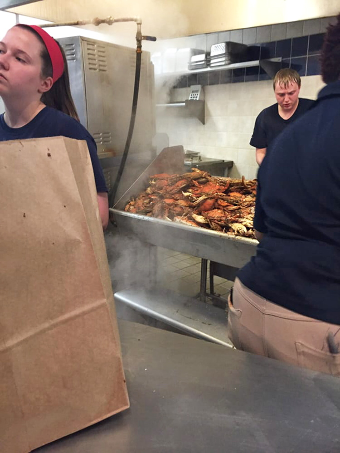 Behind every perfect crab feast is a steam room that would make a spa jealous. These kitchen warriors know exactly when each crab reaches perfection.