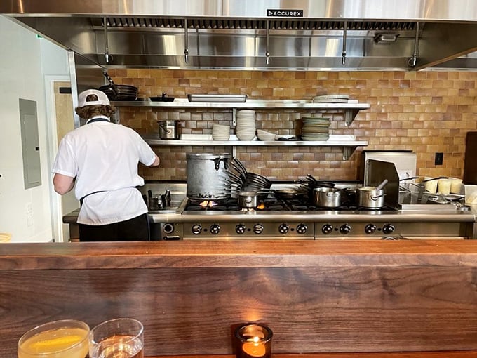 The open kitchen isn't just for show &ndash; it's a transparent promise that nothing stands between you and culinary excellence.