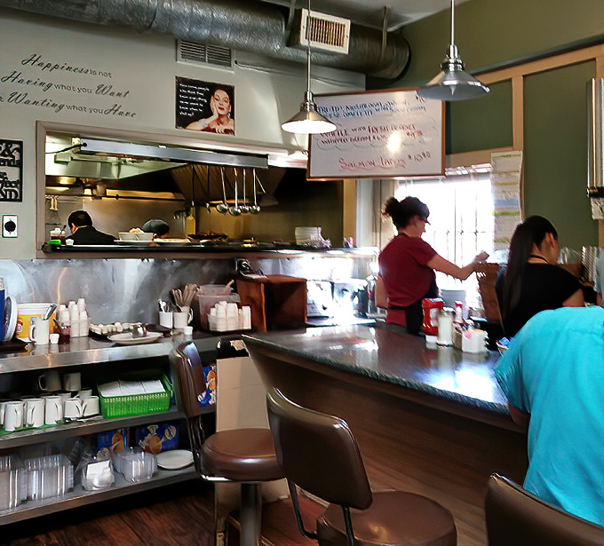 Where breakfast magic happens—the open kitchen design lets you witness the choreography of your meal coming together.