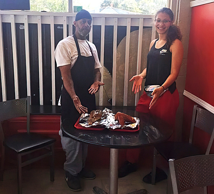 The heart and soul behind Fish And More's legendary flavors. These folks aren't just cooking—they're preserving a delicious tradition.