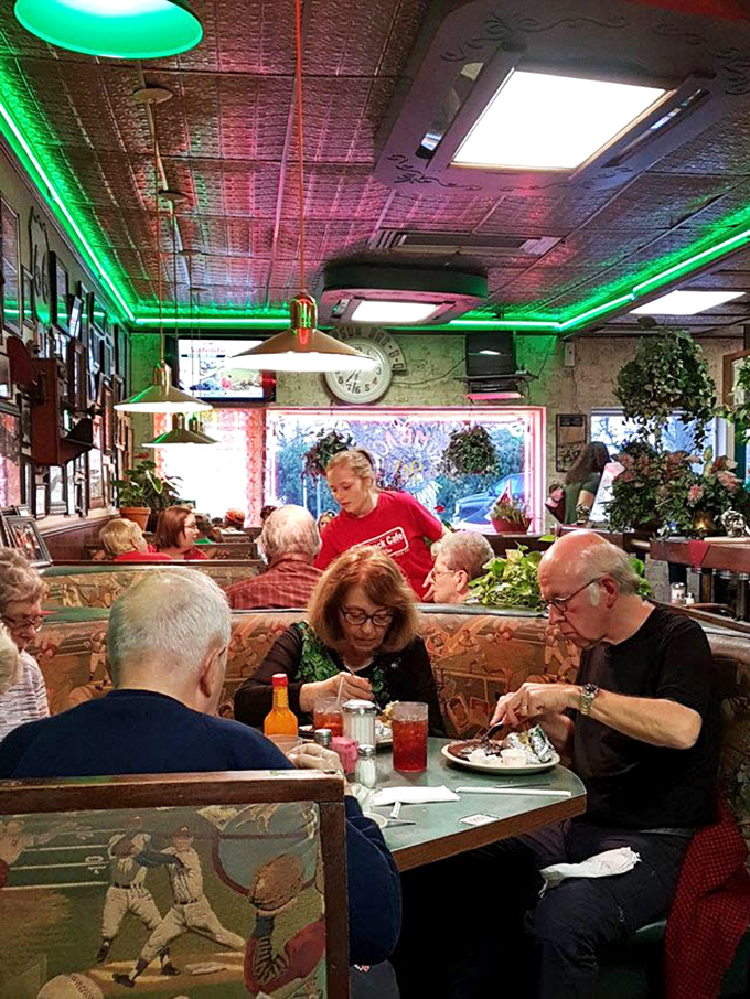 Servers in red shirts move with the efficiency that comes only from experience, delivering plates with the confidence of people who know they're carrying happiness.