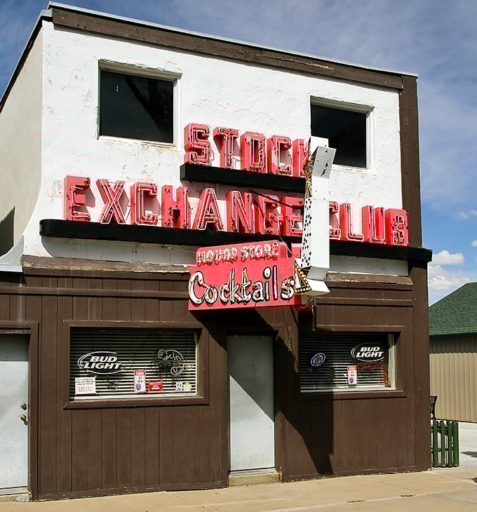 The Stock Exchange Club's vintage neon sign promises the kind of unpretentious good time that doesn't need a fancy cocktail menu or dress code.