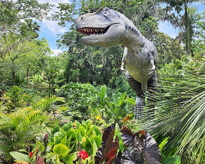 Jurassic Park meets botanical garden—this T-Rex lurking among the palms proves evolution took some interesting creative detours.