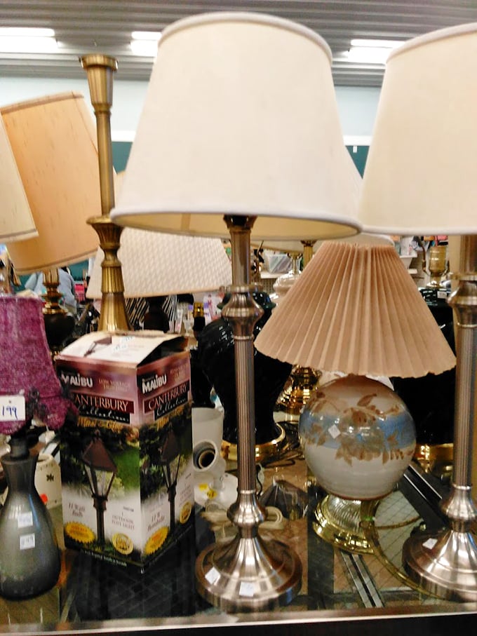 Lamp land! Where brass bases and pleated shades from three decades ago wait patiently to illuminate your reading nook or bedside table.