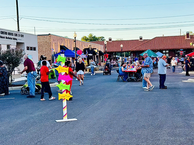 Downtown streets close for festivals where neighbors gather instead of just liking each other's posts &ndash; actual community still happens here in real time.