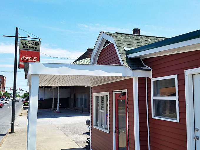 The Barn BBQ&mdash;where that red exterior promises smoked delights that would make vegetarians question their life choices.