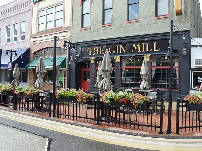 The Gin Mill's inviting patio practically whispers, "Your afternoon could be spent here instead of mowing the lawn." 