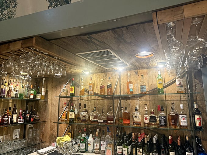 This well-stocked bar doesn't just serve drinks; it displays them like liquid artwork behind glass—promising sophisticated sipping in small-town America.