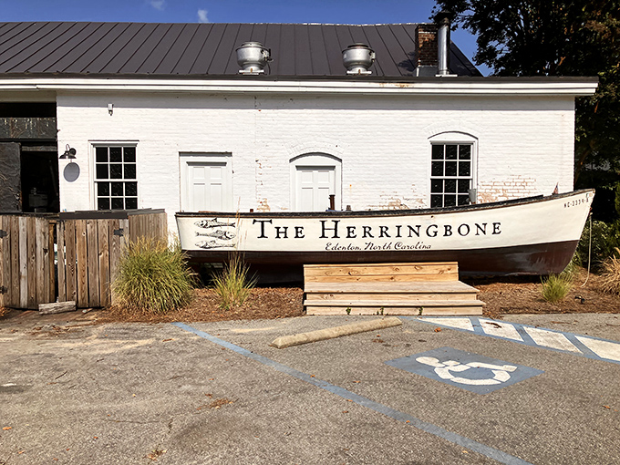 The Herringbone restaurant announces itself with an actual boat &ndash; because when you're this close to the water, why be subtle?