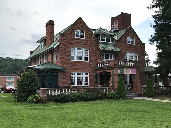 Thistledown at Seger House combines stately red sandstone architecture with the kind of green lawn that says "impressive" without saying "expensive."