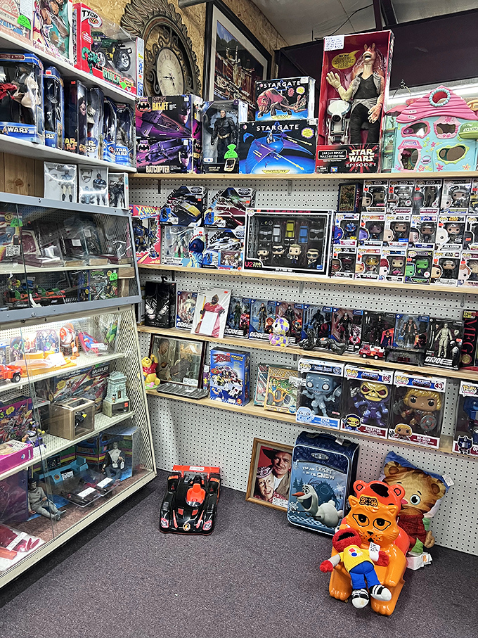 A toy collector's dream corner where childhood heroes wait patiently in their original packaging. That Daniel Tiger plush is judging your decision not to buy him.