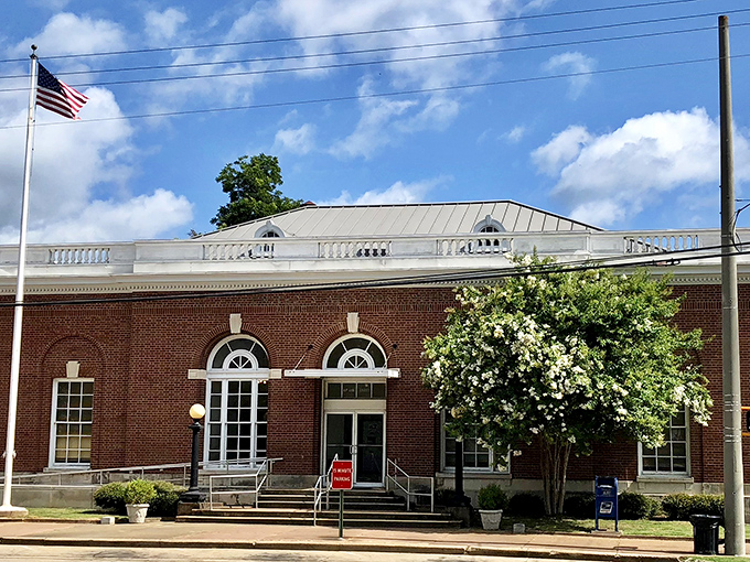 This handsome brick post office building delivers more than mail – it's a daily touchpoint for community connection and local news.