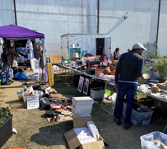 The beautiful chaos of a true flea market—where vintage window frames meet modern knick-knacks in a dance of decades.