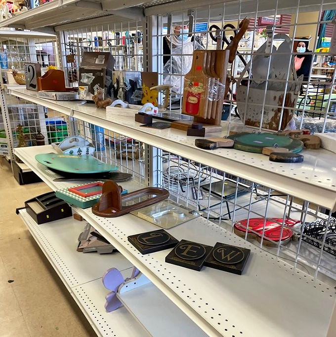 Home d&eacute;cor heaven! From quirky wooden figurines to practical serving pieces, this shelf is where personality meets practicality at bargain prices.