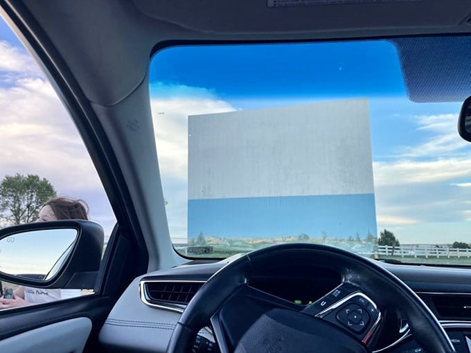 The dashboard view that generations have enjoyed&mdash;framing blockbusters through windshields while tuning in on the car radio.