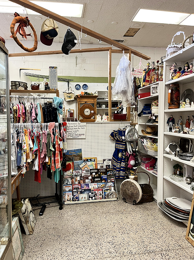 A corner booth packed with more stories than your grandfather after his third whiskey. That drum and vintage clothing create a perfect historical harmony.