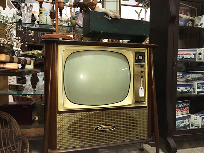 A vintage console television that probably weighs more than a small car and looks absolutely magnificent doing it, thank you.