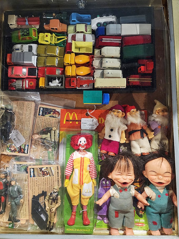 Ronald McDonald meets vintage dolls in this time capsule of childhood memories. Someone's attic treasures become another generation's collectibles.