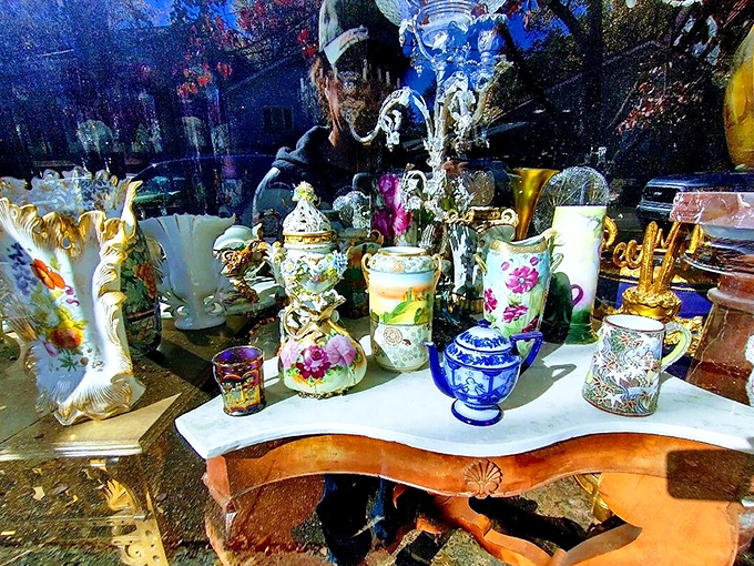 Window shopping reaches fine art status. These porcelain treasures create a still life painting that changes with every passing cloud.