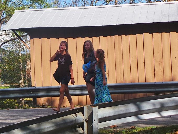 The bridge provides a perfect gathering spot for visitors of all ages, proving that architectural heritage doesn't need interactive screens to capture attention.