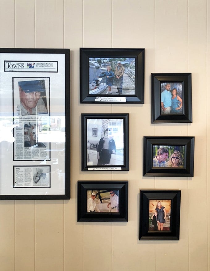Family photos tell the story better than any menu could. This wall says, "We've been feeding folks for generations."