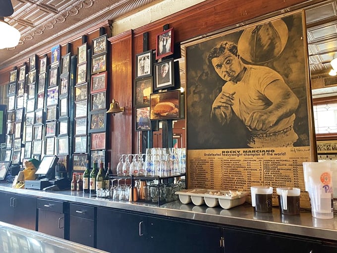 The bar area showcases Pittsburgh sports history alongside bottles&mdash;where local legends live on while new memories are made daily.