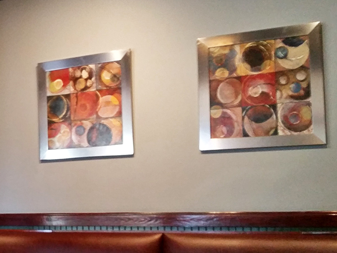 Wall art that doesn't distract from the main attraction but gives you something to contemplate between bites of beefy perfection.