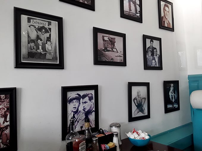 The wall doesn't just display memorabilia&mdash;it's a time machine, each frame a portal to when Elvis was king and milkshakes cost a quarter.