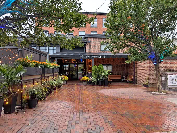 Waterworks Food + Drink's brick patio at twilight creates the kind of ambiance that makes you order one more round.