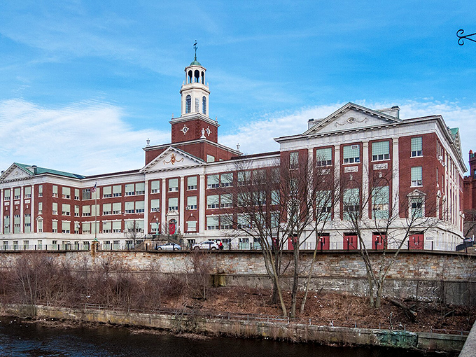 Tolman High School stands proudly along the Blackstone River, its red brick and white trim a testament to educational architecture of a bygone era.
