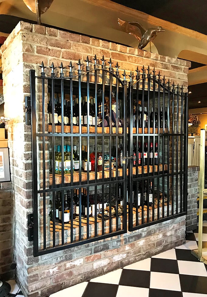 The wine display isn't just storage—it's a gallery exhibition of potential pleasure, each bottle a different story waiting to be told.