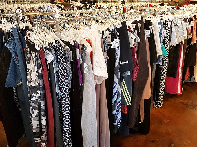 The women's section hangs like a colorful textile tapestry, offering patterns and styles that span decades of fashion evolution.